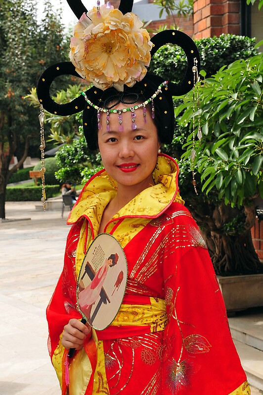 "A Chinese Model Showing Off A Colourful Costume. Xi'an, China." by ...