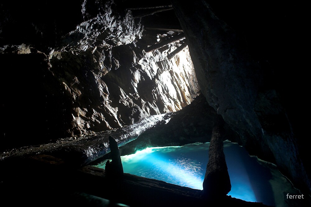 "flooded winze lit from below in deep adit level. Coniston copper mine ...