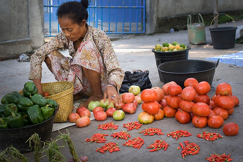 "Food vendor at "new" market, Baucau, East Timor" by John Tozer | Redbubble