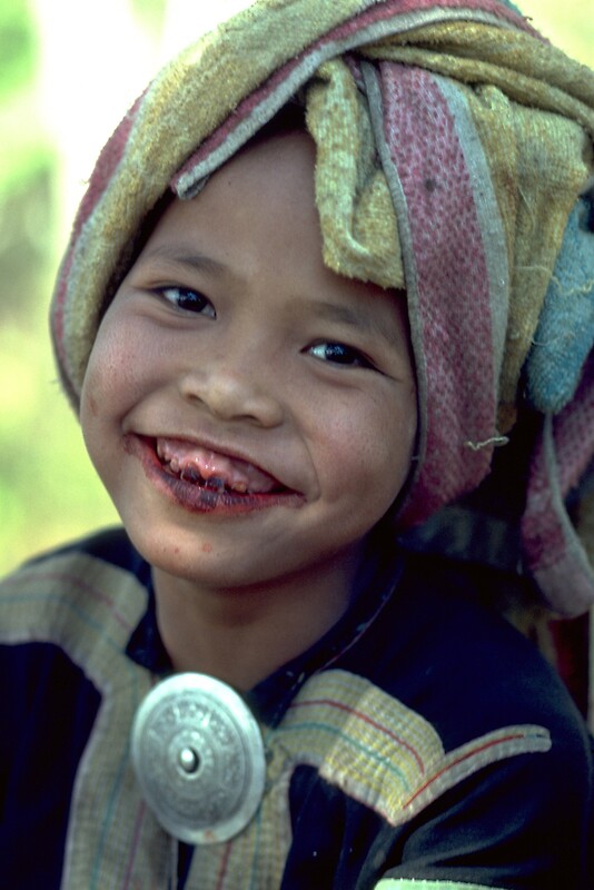 "Lahu girl with betel smile" by John Spies | Redbubble