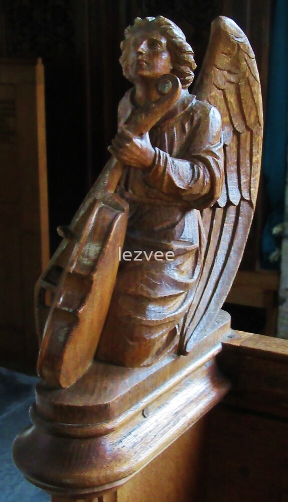 "Angel Wood Carving" by lezvee | Redbubble