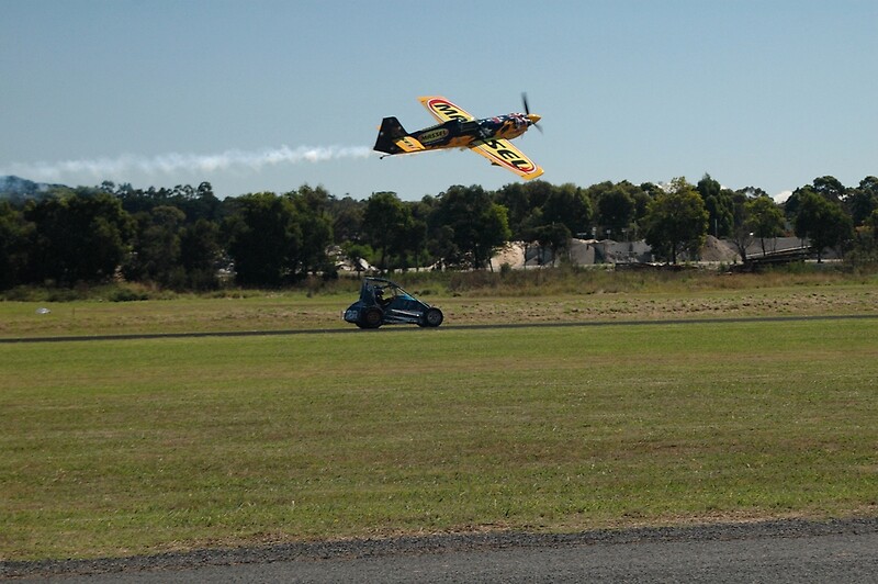 "Plane Vs Car,Tyabb Airshow,Australia 2012" by muz2142 | Redbubble