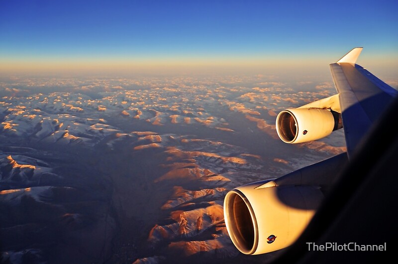 "Boeing 747 wing view over the Himalayas during sunset" by ...